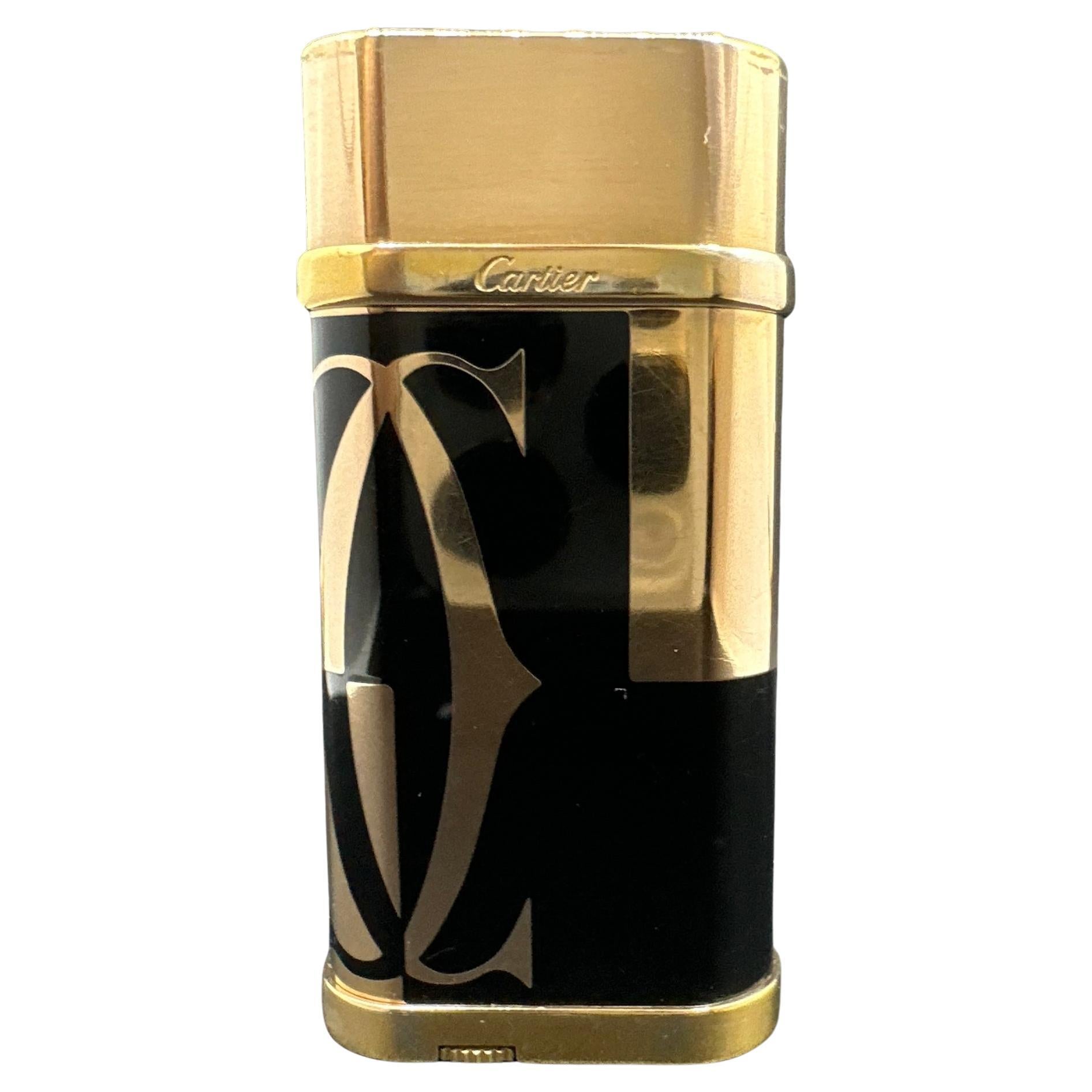 A Les Must De Cartier Paris 18k gold plated lighter at 1stDibs