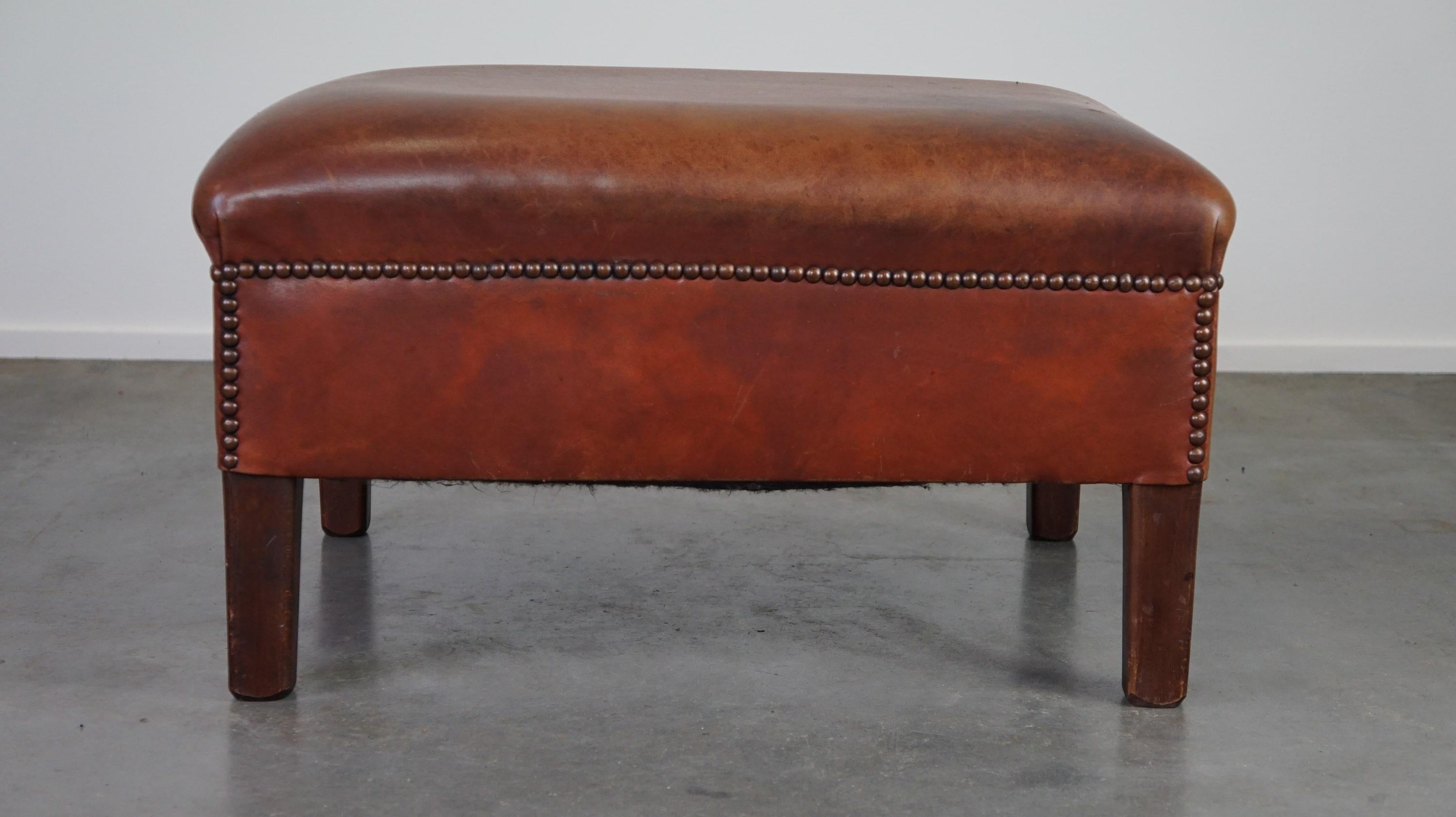 Leather ottoman in classic English style finished with decorative nails ...