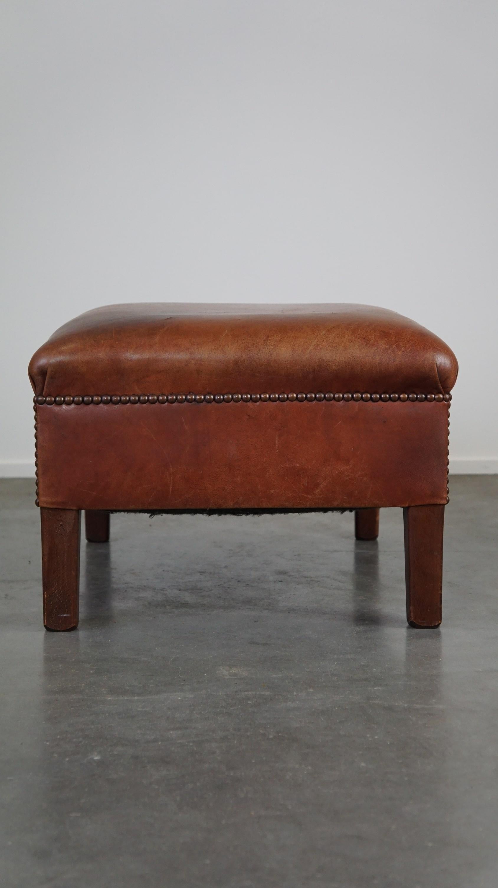 Leather ottoman in classic English style finished with decorative nails ...