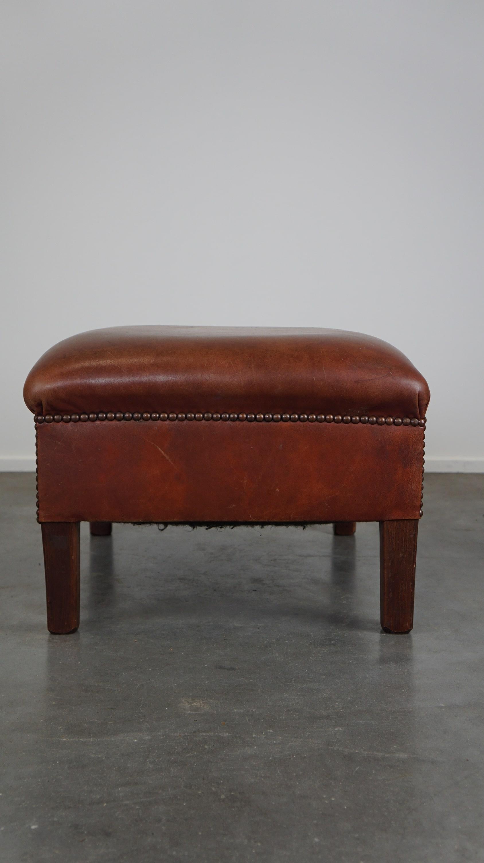 Leather ottoman in classic English style finished with decorative nails ...