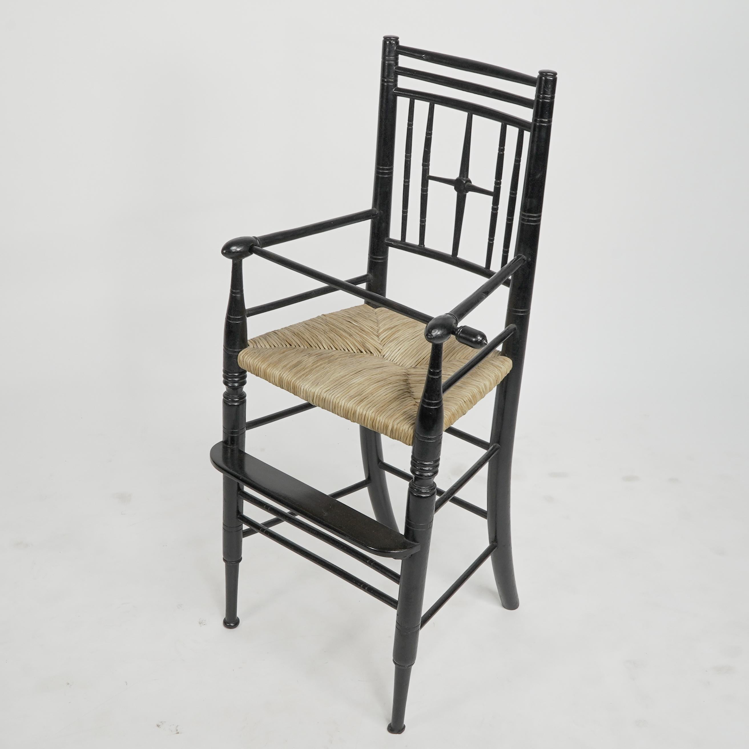 Liberty and Co. An Argyle Aesthetic Movement ebonized rush seat child's ...