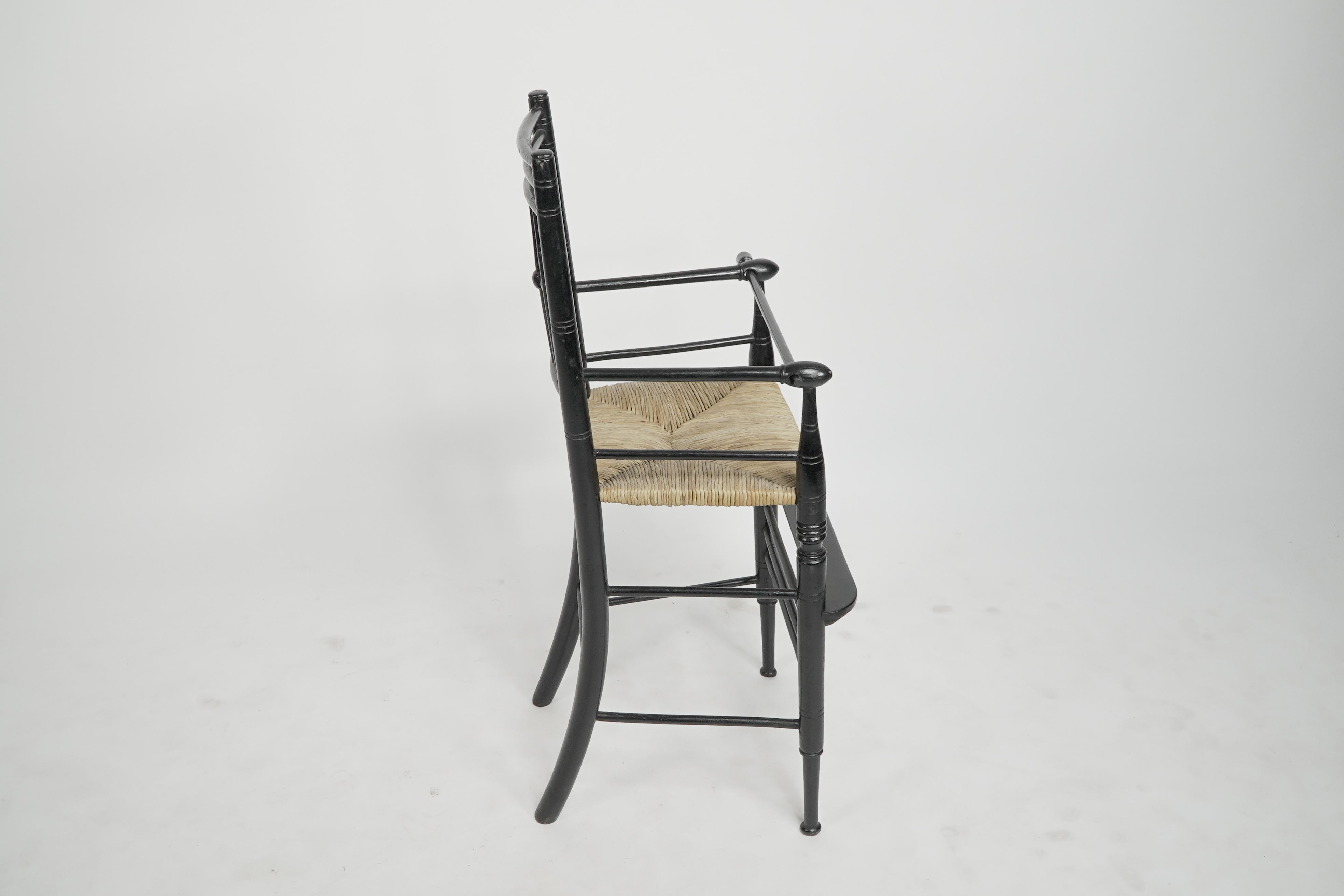 Liberty and Co. An Argyle Aesthetic Movement ebonized rush seat child's ...