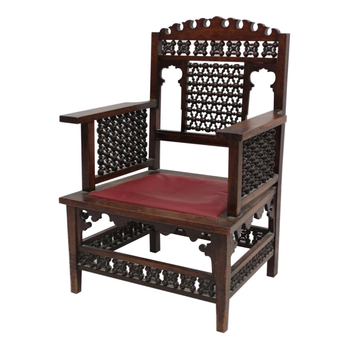 Liberty and Co a Moorish Walnut Armchair with Mashrabiya Turned Details ...