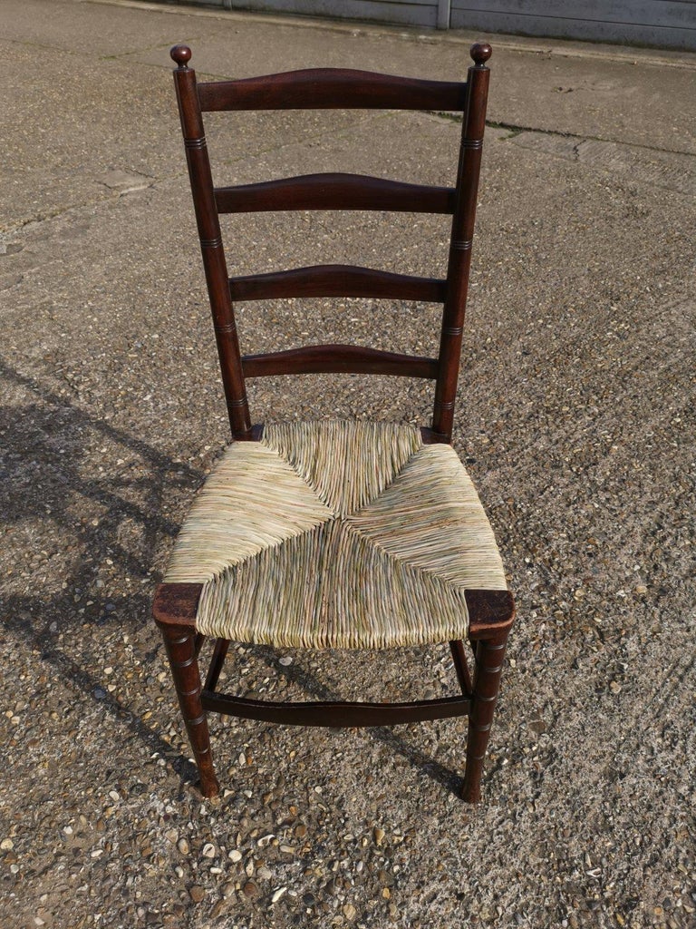 Liberty and Co. An English Aesthetic Movement Walnut Ladder Back Rush ...