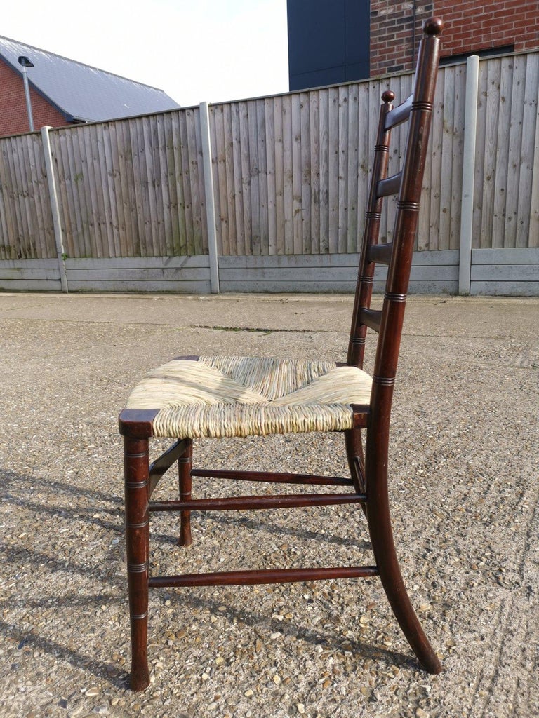 Liberty and Co. An English Aesthetic Movement Walnut Ladder Back Rush ...
