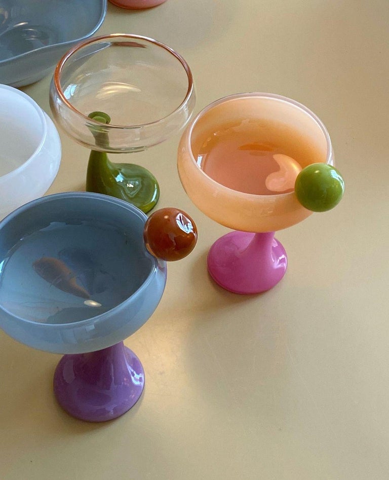 Lime, Creamy Melon and Pink Bon Bon Cocktail with a Twist Glass by ...