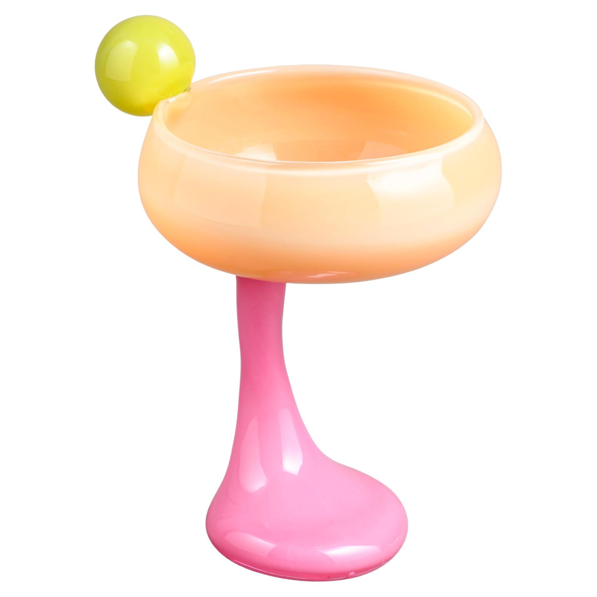 Lime, Creamy Melon and Pink Bon Bon Cocktail with a Twist Glass by ...