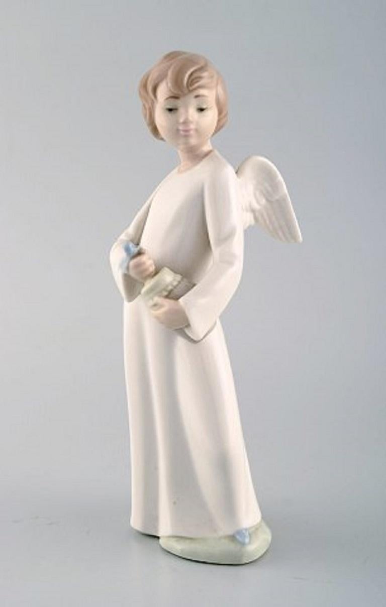 Lladro and Nao, Spain, Four Porcelain Figurines of Children, 1980s ...