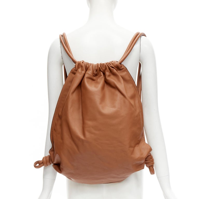 LOEWE brown soft leather Anagram embossed logo drawstring backpack bag ...