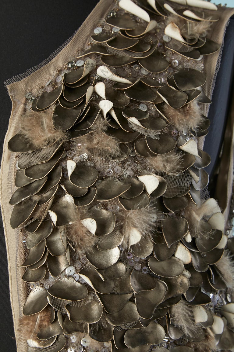 Long evening vest made of petals of tulle, feathers and pvc Maurizio ...