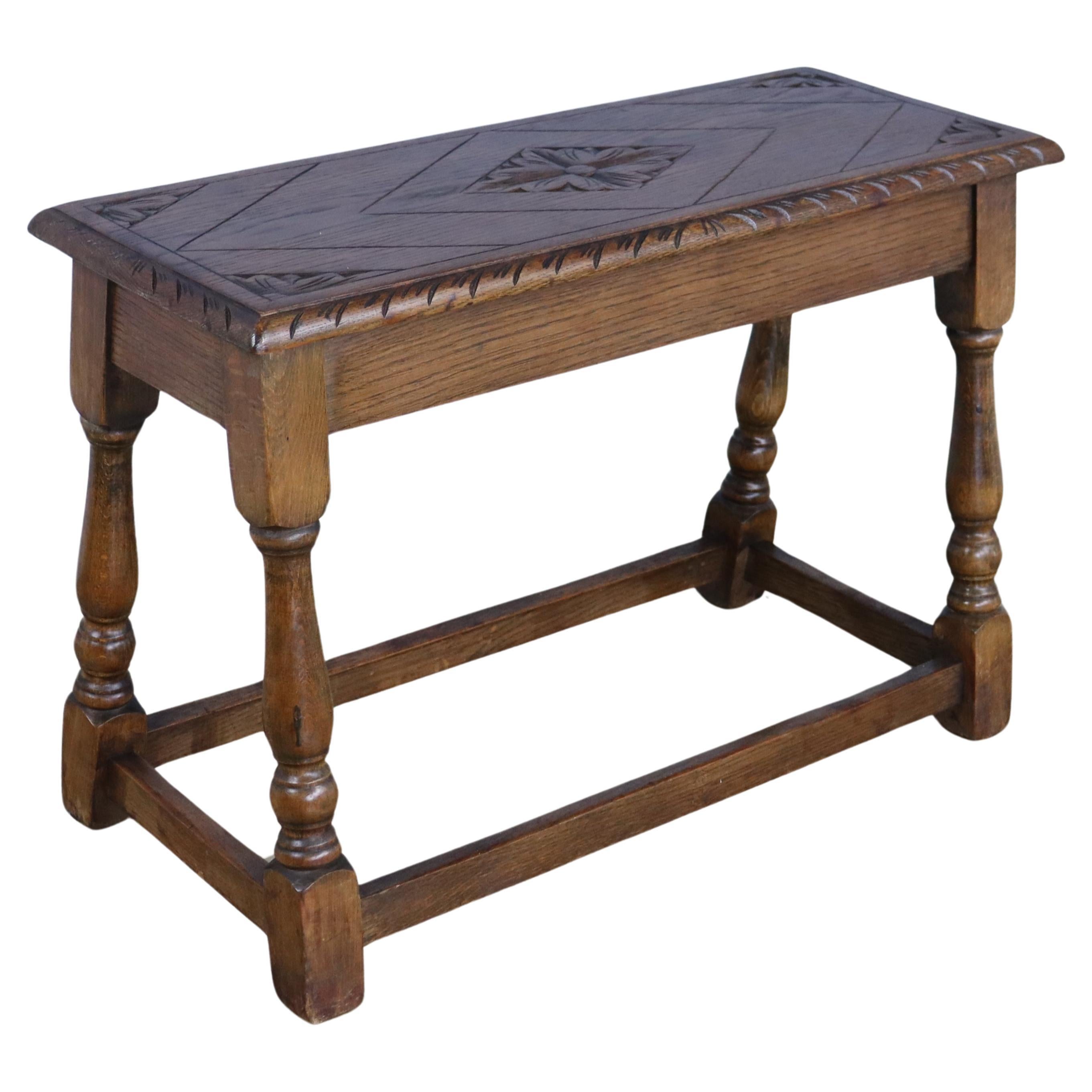 Long Oak Joint Stool with Floral Carving For Sale at 1stDibs