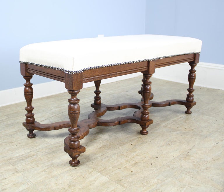 Long Oak Stool with Turned Legs and Criss-Cross Stretcher Base at 1stDibs