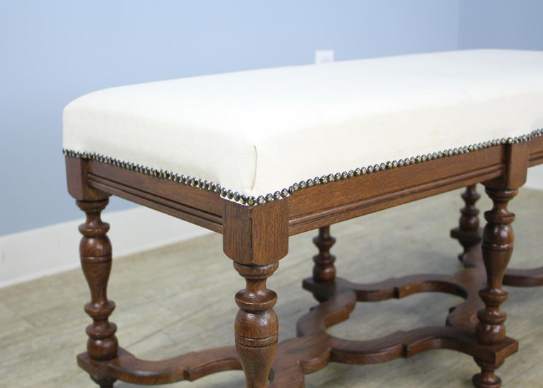 Long Oak Stool with Turned Legs and Criss-Cross Stretcher Base at 1stDibs