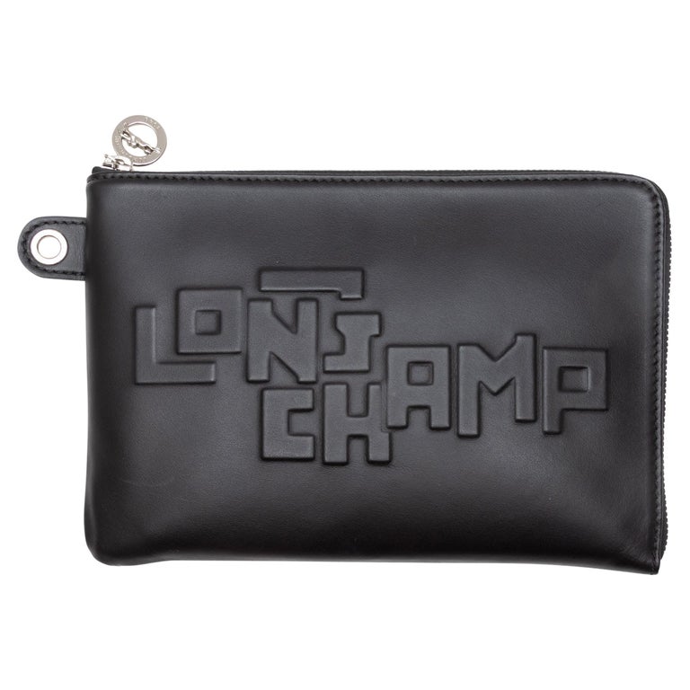 Longchamp Black Leather Logo Clutch For Sale at 1stDibs