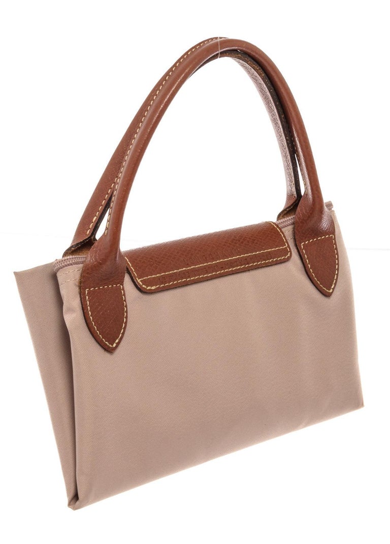 Longchamp Light Pink Nylon Le Pliage Medium tote bag with gold-tone ...