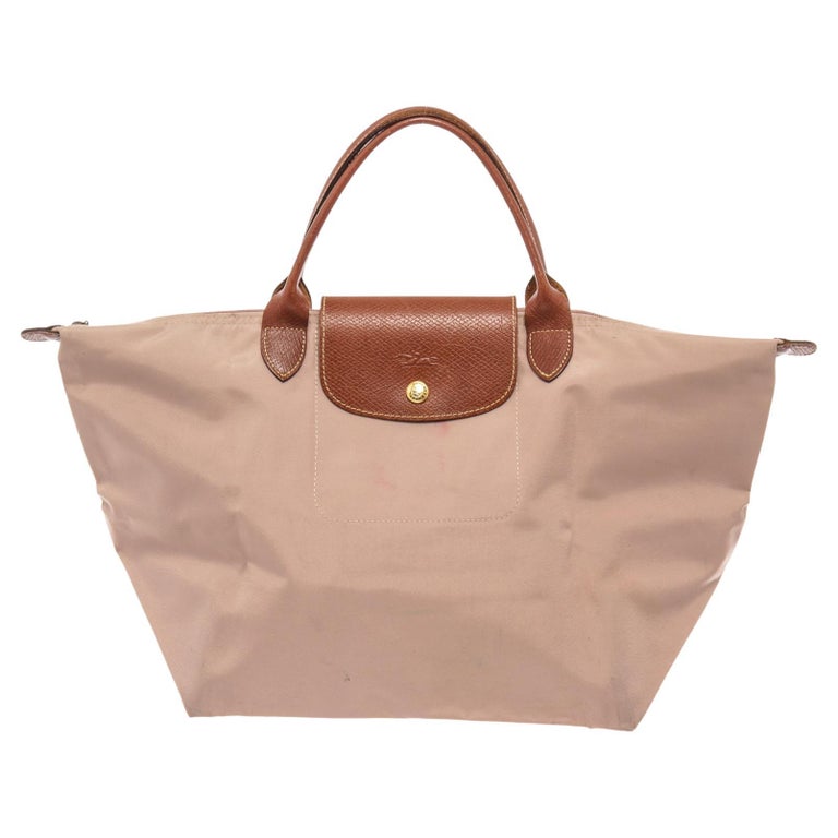 Longchamp Light Pink Nylon Le Pliage Medium tote bag with gold-tone ...