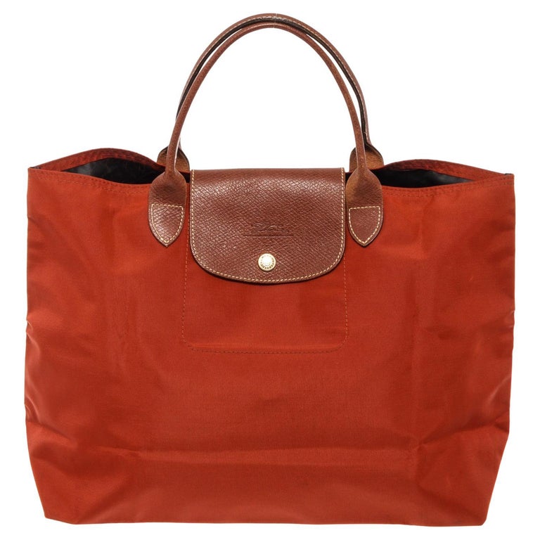 Longchamp Red Nylon Le Pliage Medium no zipper tote bag with gold-tone ...