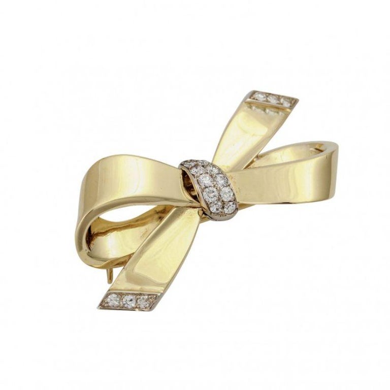 "Loop" Brooch Set with Brilliant-Cut Diamonds and an Octagonal Diam ...