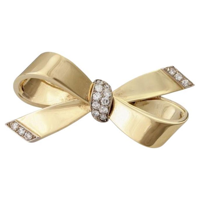 "Loop" Brooch Set with Brilliant-Cut Diamonds and an Octagonal Diam ...