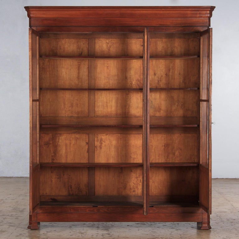 Louis Philippe Period Walnut Three-Door Bookcase, 1830s at 1stDibs