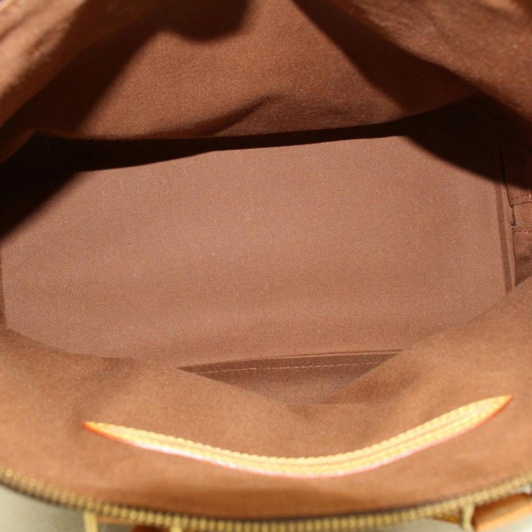 Louis Vuitton Alma Monogram Pm 868786 Brown Coated Canvas Satchel For Sale at 1stDibs