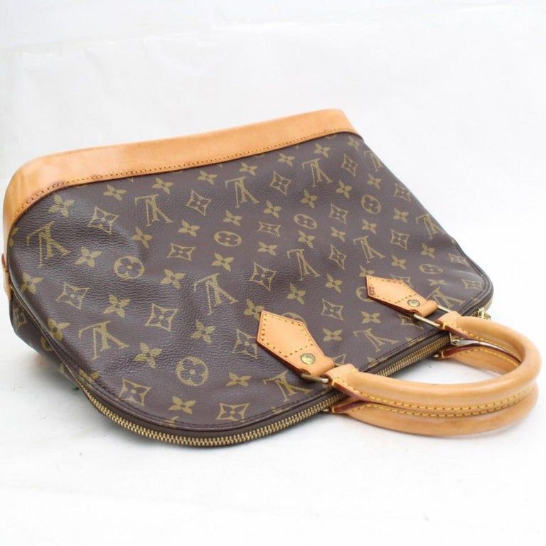 Louis Vuitton Alma Monogram Pm 868786 Brown Coated Canvas Satchel For Sale at 1stDibs