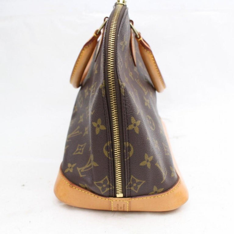 Louis Vuitton Alma Monogram Pm 868786 Brown Coated Canvas Satchel For Sale at 1stDibs