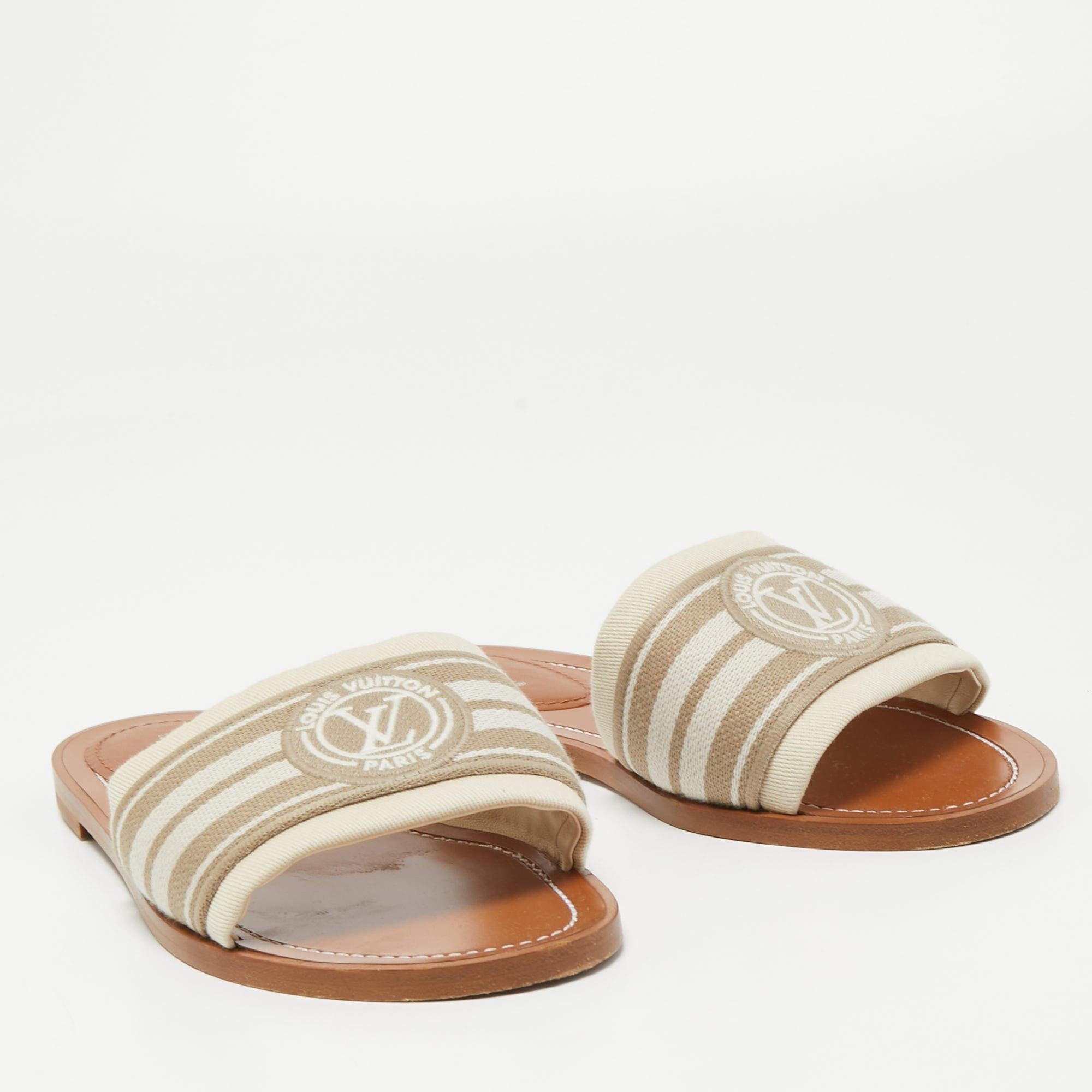 Louis Vuitton Beige Canvas Logo Flat Slides Size 38 For Sale at 1stDibs