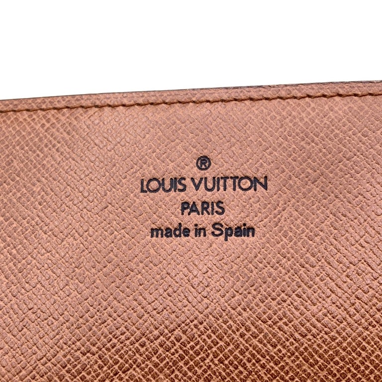 Louis Vuitton Brown Monogram Canvas Long Bifold Bill Wallet For Sale at ...