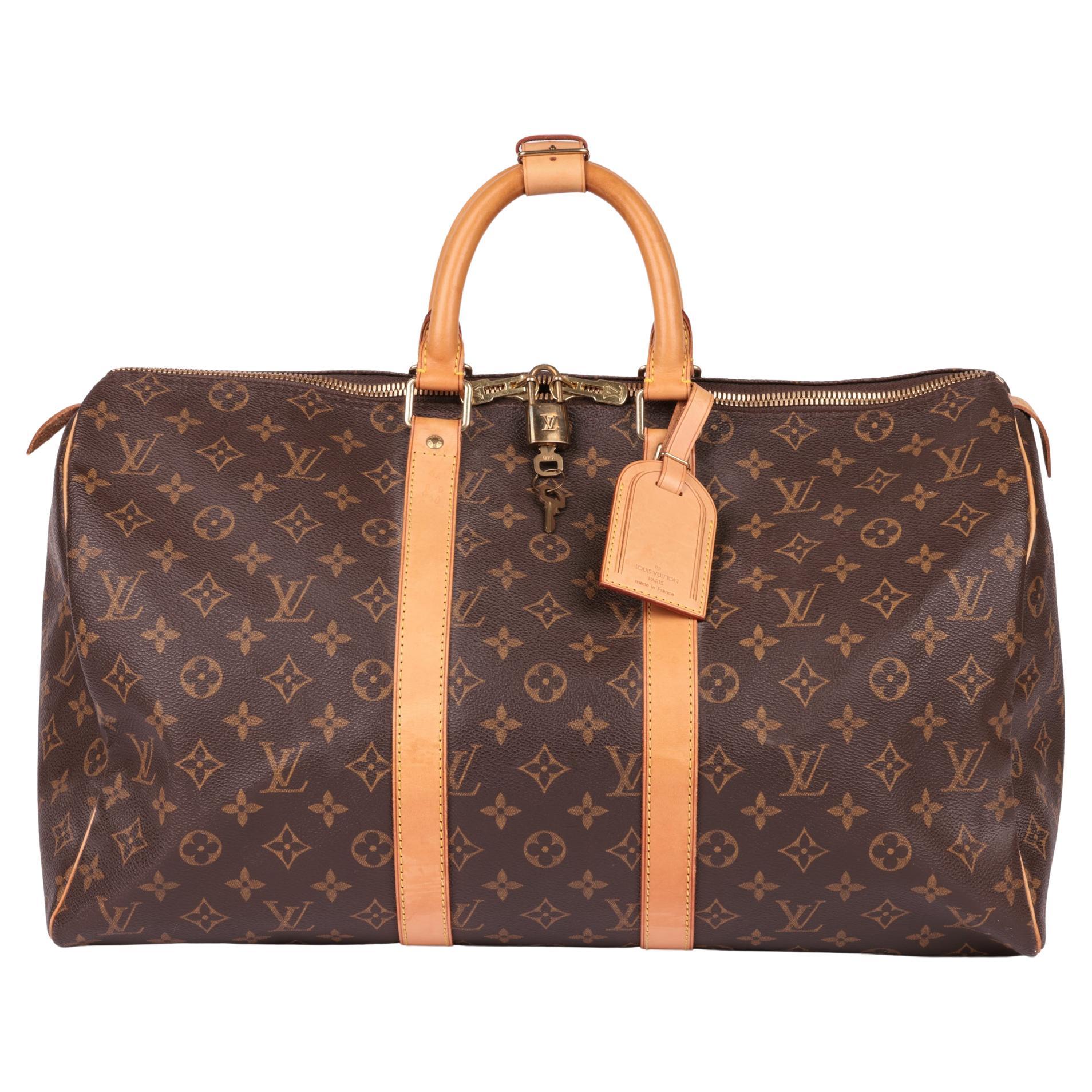 LOUIS VUITTON Brown Monogram Coated Canvas and Vachetta Leather Keepall Vintage 45 at 1stDibs