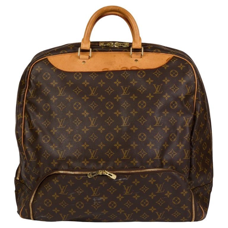 LOUIS VUITTON Brown Monogram Coated Canvas Vintage Evasion at 1stDibs