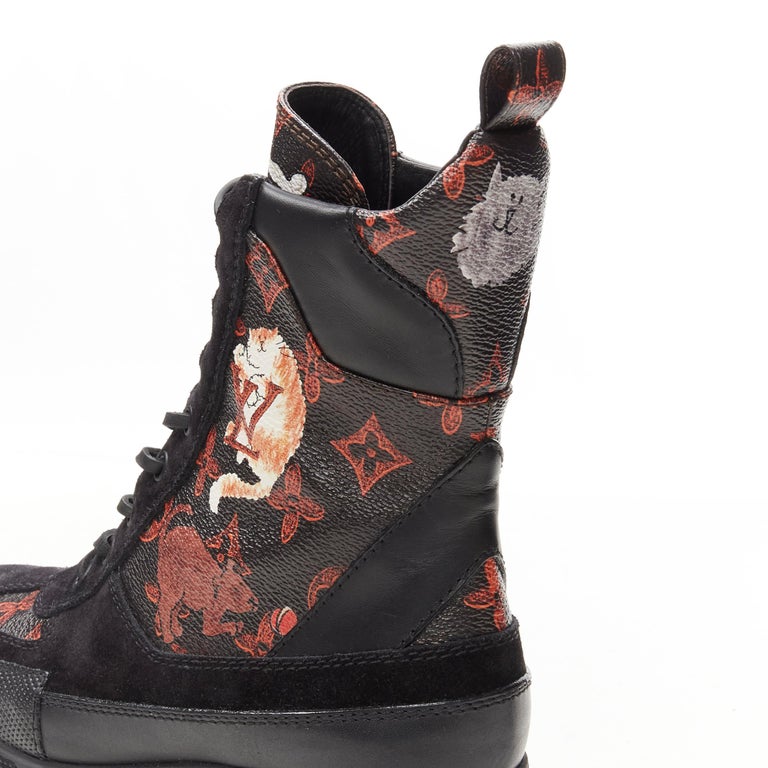 LOUIS VUITTON Catogram black monogram cat print suede trim combat boot ...