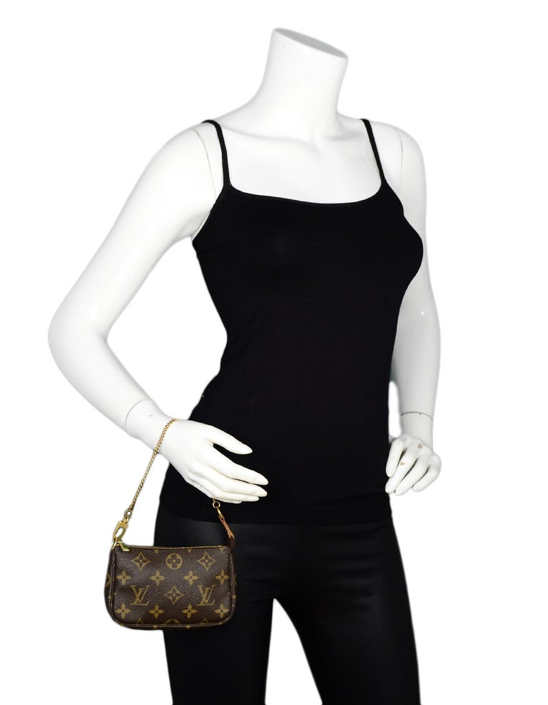 Louis Vuitton Coated Canvas Monogram Mini Pochette Bag For Sale at 1stDibs