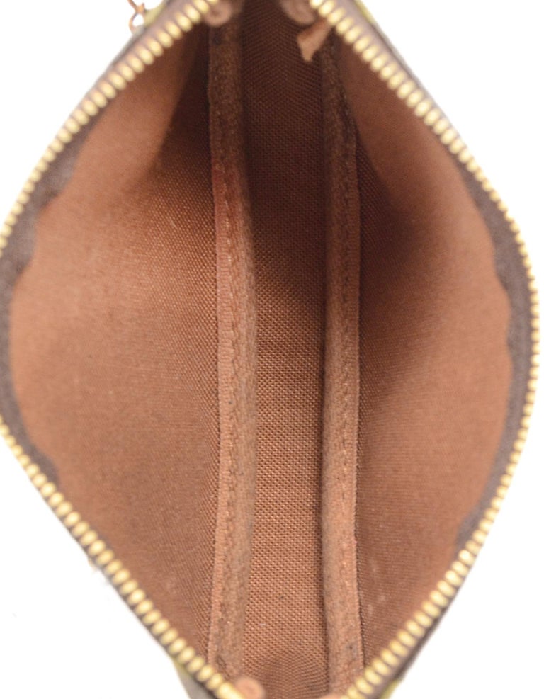 Louis Vuitton Coated Canvas Monogram Mini Pochette Bag For Sale at 1stDibs
