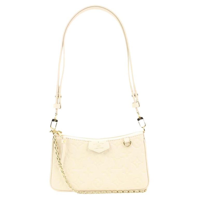 Louis Vuitton Cream Monogram Leather Empreinte Easy Pouch on Strap ...