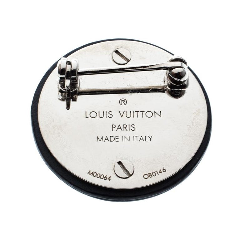 Louis Vuitton Cut Out World Map Leather Silver Tone Pin Brooch at 1stDibs