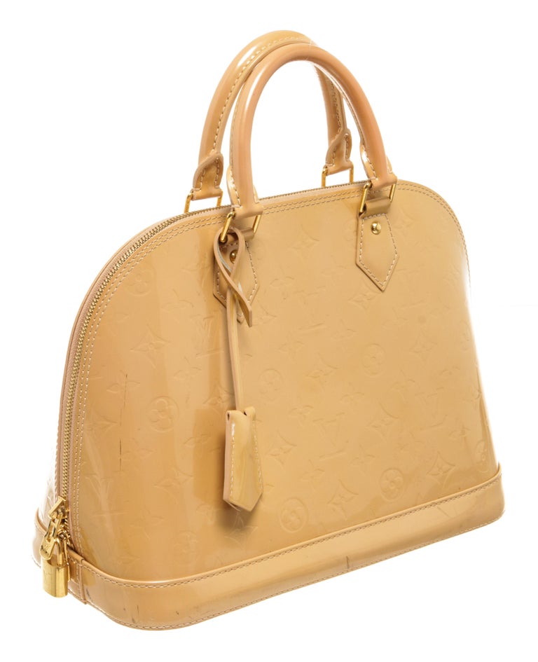 Louis Vuitton Gold Monogram Vernis Alma PM Handbag For Sale at 1stDibs
