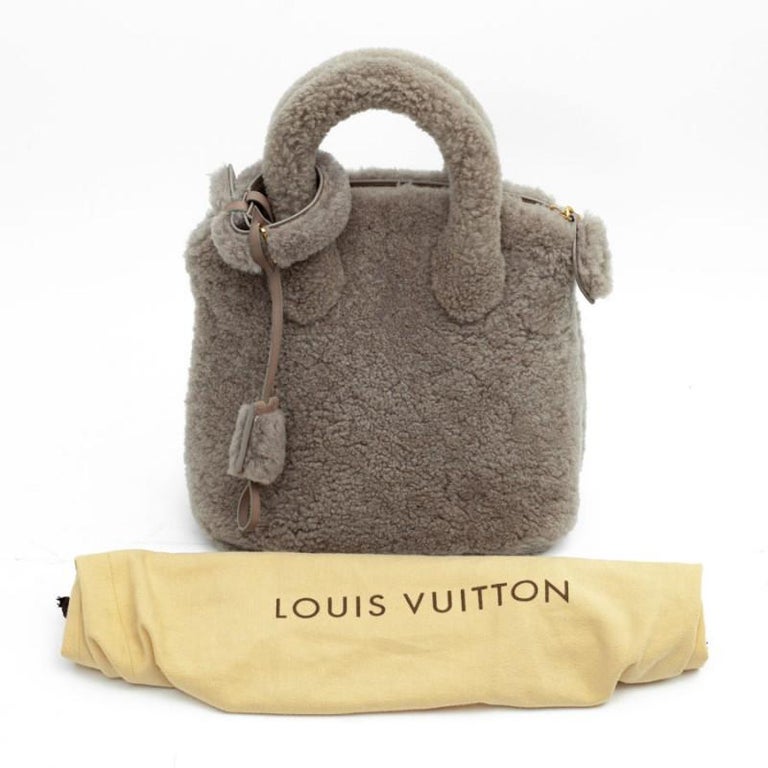 LOUIS VUITTON Gray Lockit Bag at 1stDibs