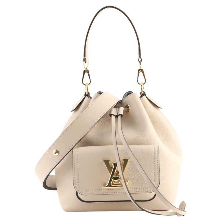 Louis Vuitton Lockme Pocket Bucket Bag Leather at 1stDibs