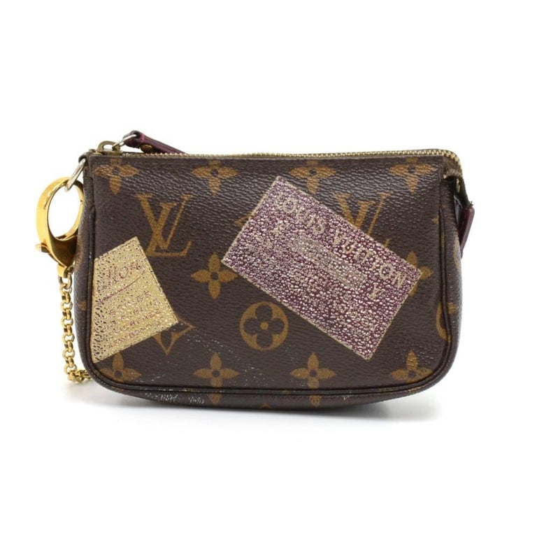 Louis Vuitton Mini Pochette Accessories Monogram Stamp Canvas Bag at ...