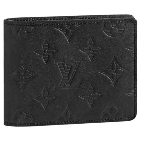 Louis Vuitton Embossed Wallet - 69 For Sale on 1stDibs