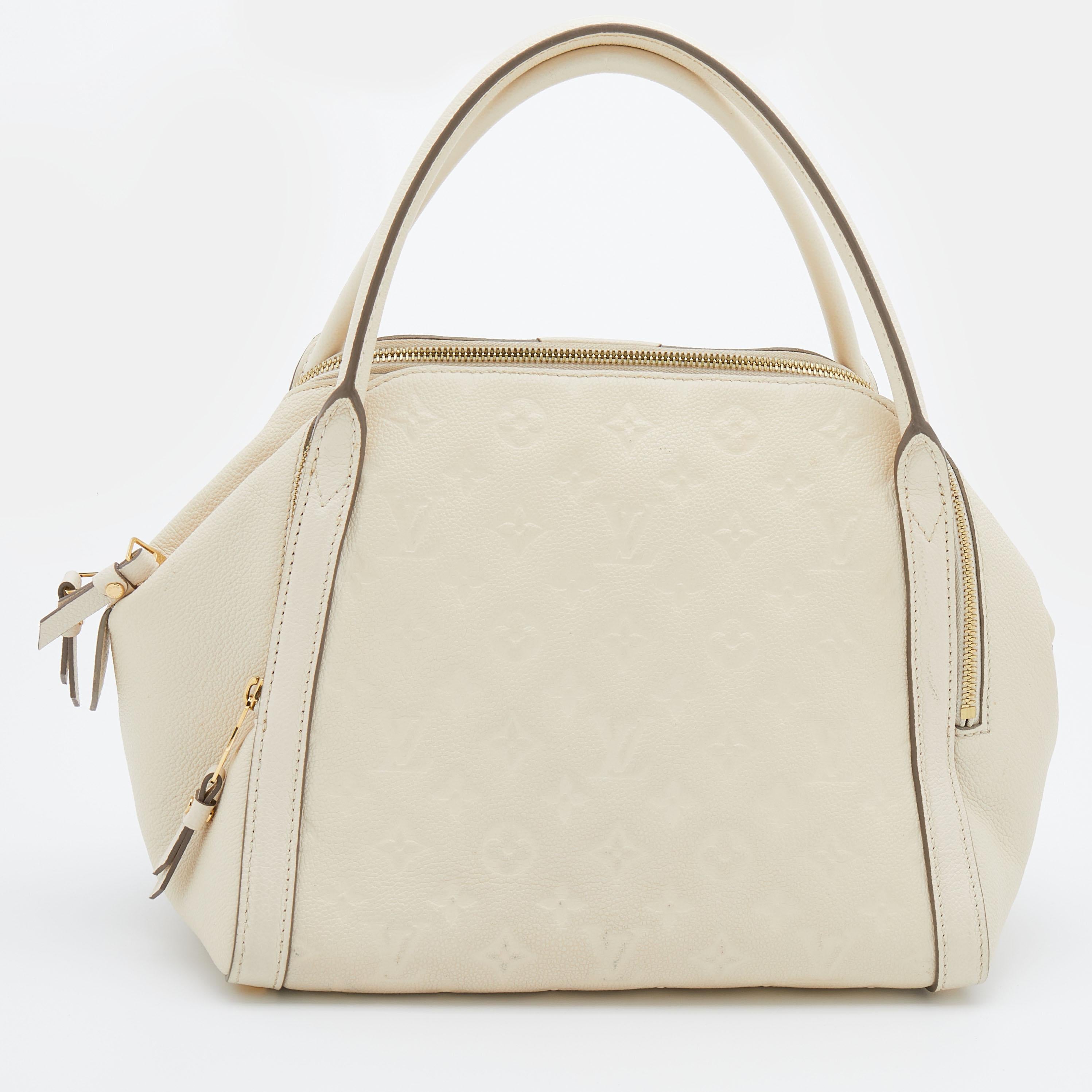 Louis Vuitton Neige Monogram Empreinte Leather Marais MM Bag at 1stDibs ...