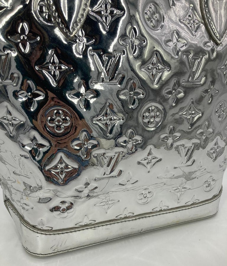 Louis Vuitton Silver Mirror Lockit Bag For Sale at 1stDibs