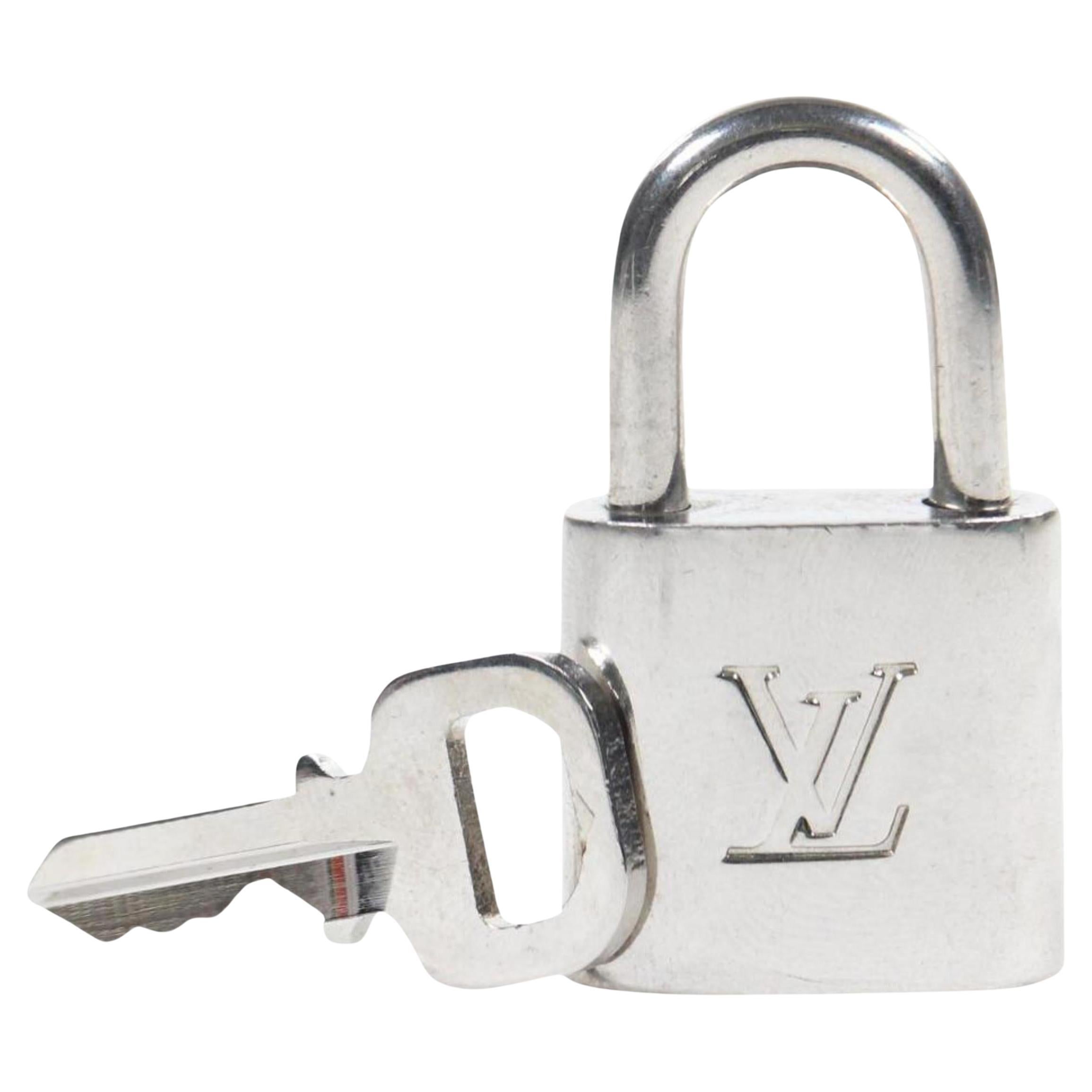 Louis Vuitton LV Silver Bag Charm Keychain at 1stDibs | lv keychain ...