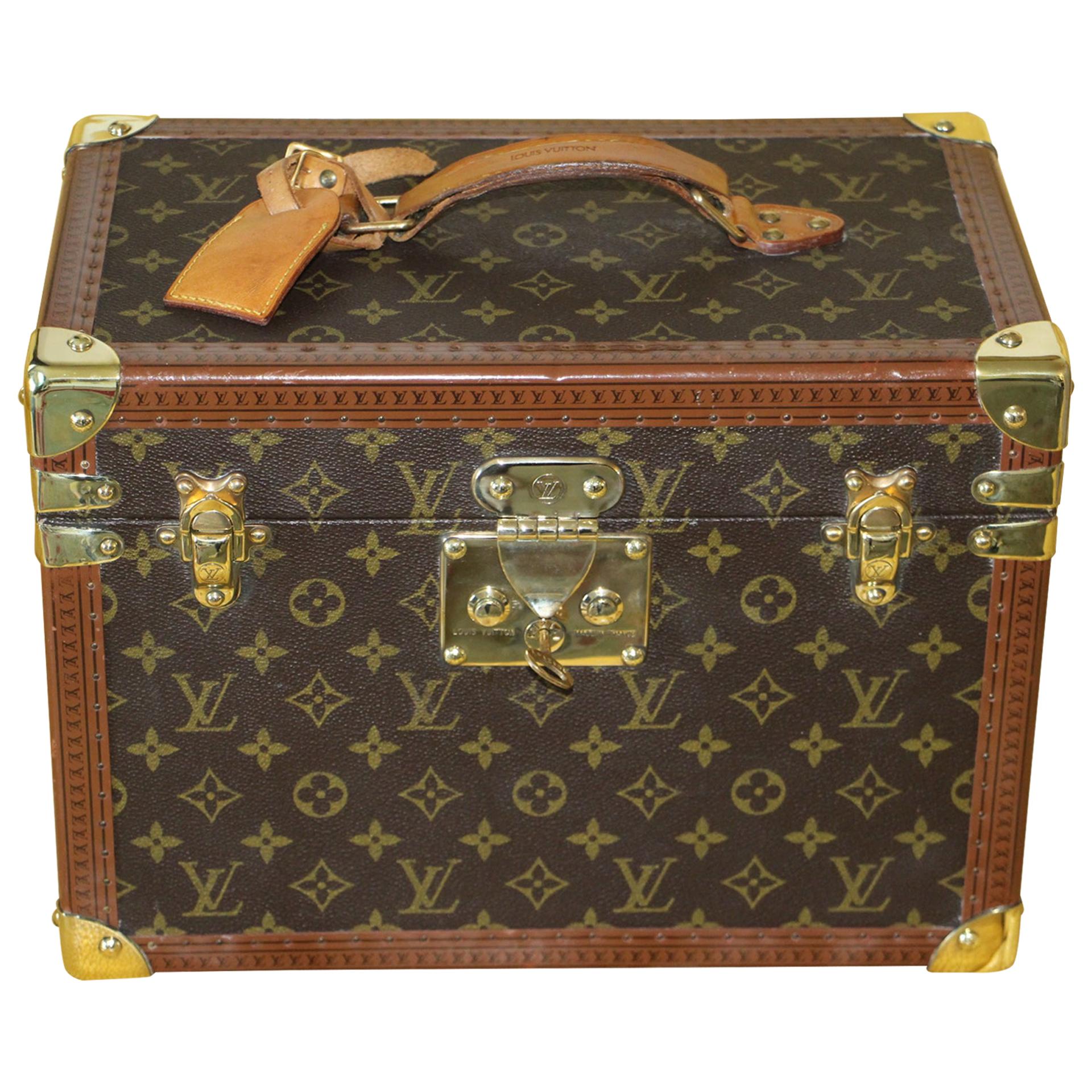 Louis Vuitton Lockit Vertical Monogram Double Handle Bag at 1stDibs
