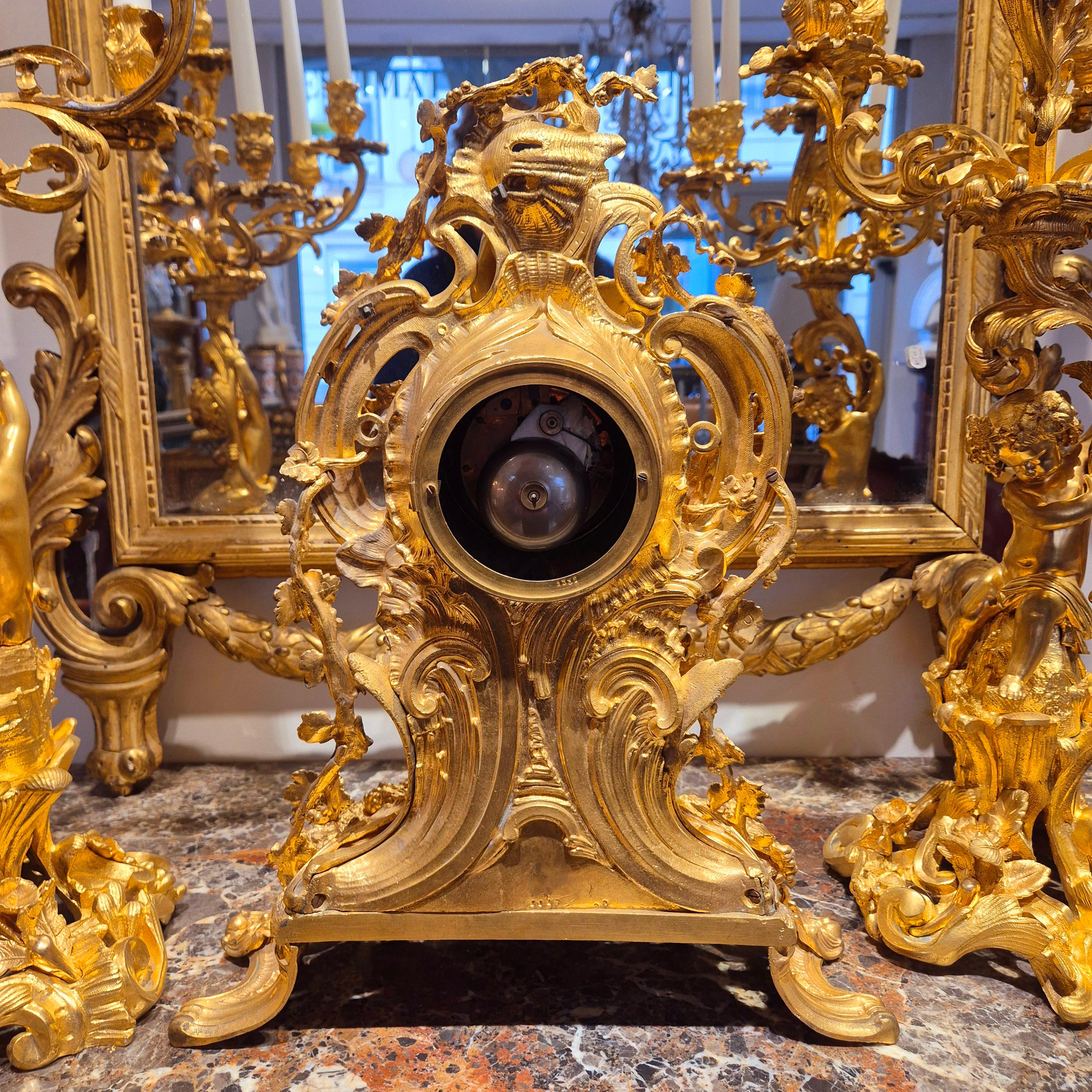 Louis XV style mantel set in gilded bronze decorated with putti, 19th ...