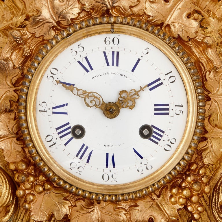 Louis XV Style Patinated and Gilt Bronze Mantel Clock at 1stDibs