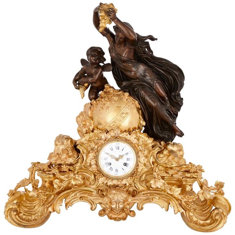 Louis XV Style Patinated and Gilt Bronze Mantel Clock at 1stDibs