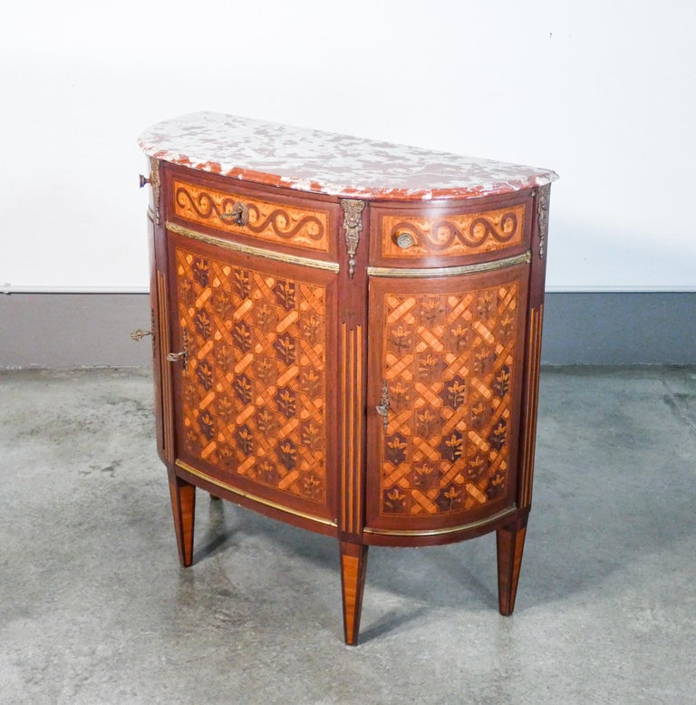 Louis XVI style half- moon sideboard in richly inlaid wood in various ...
