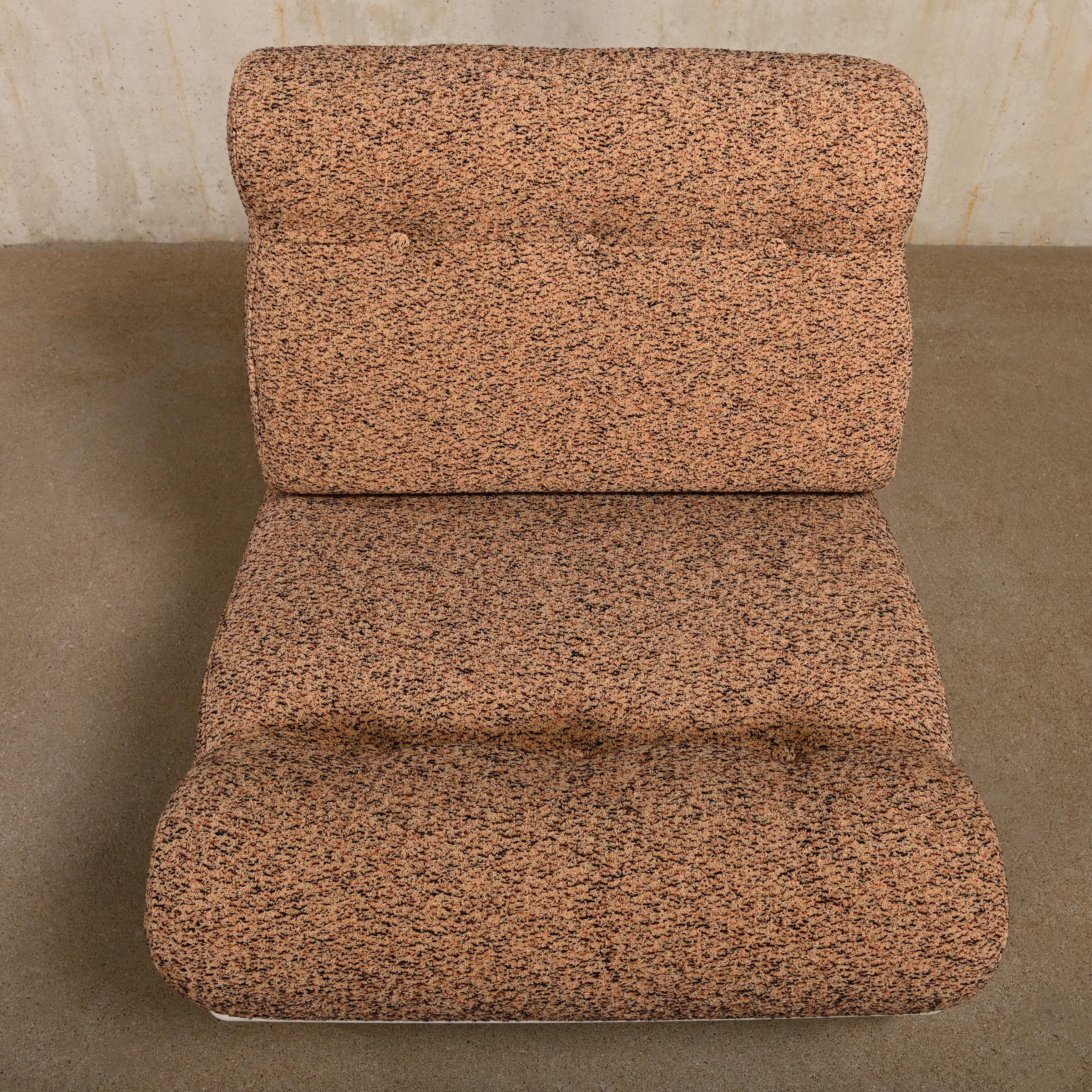 Lounge Seating Elements with speckled fabric and white fiberglass ...